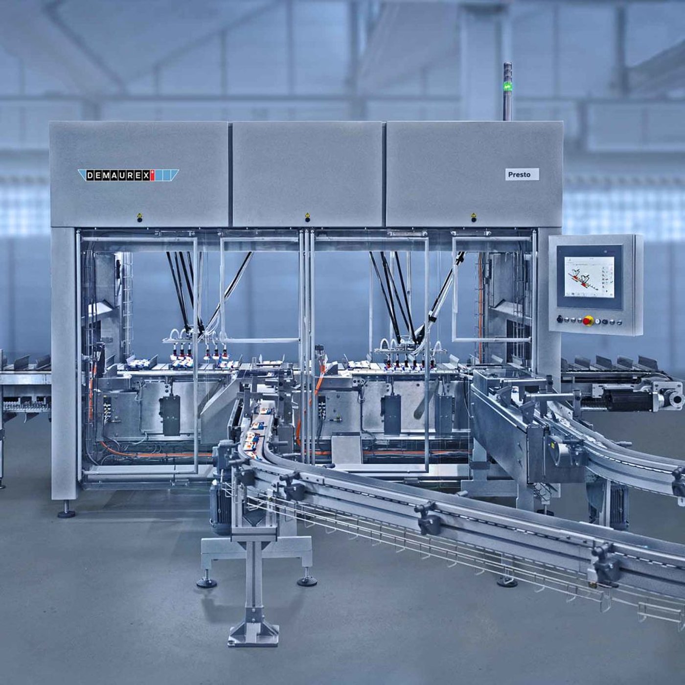 Presto - loading of multipack wrappers and cartoners - Rotzinger